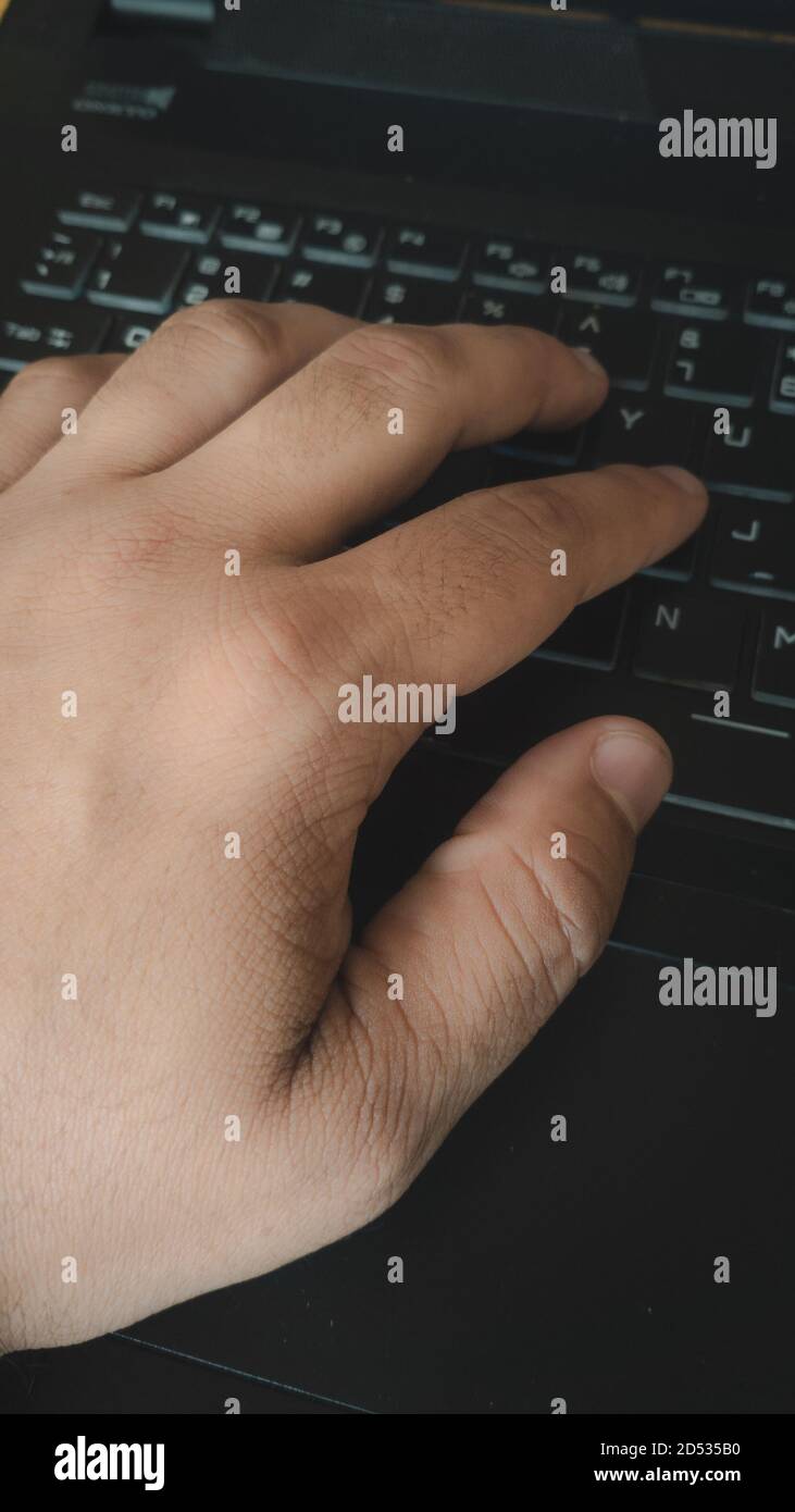 Man typing on keyboard letters hi-res stock photography and images - Alamy