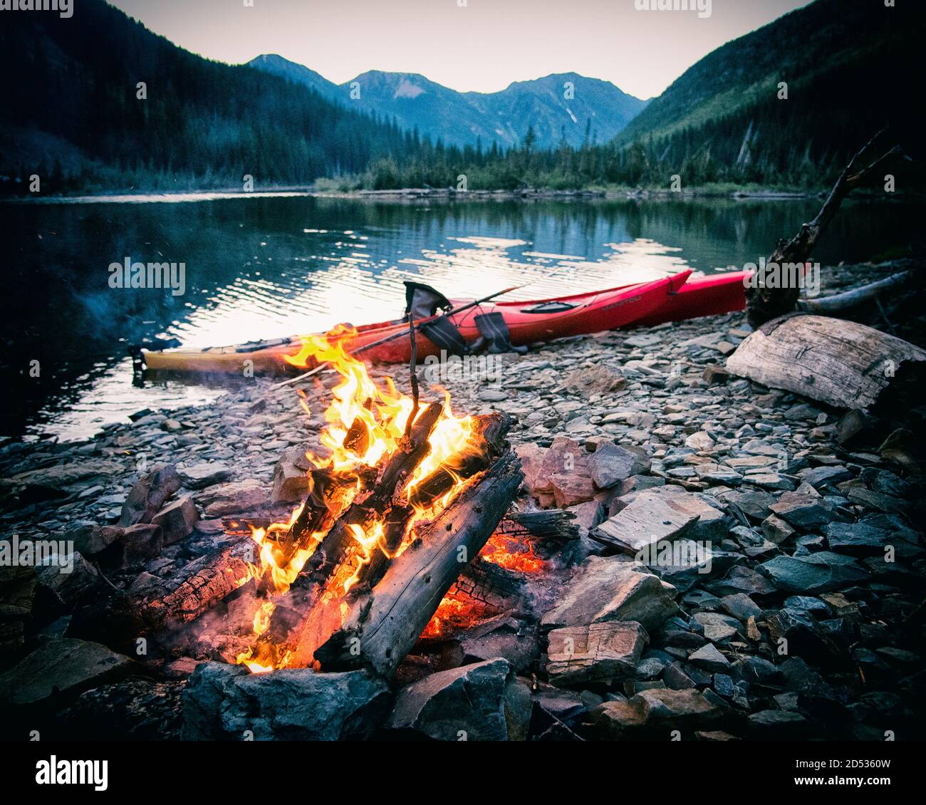 Campfire and Kayak Stock Photo - Alamy