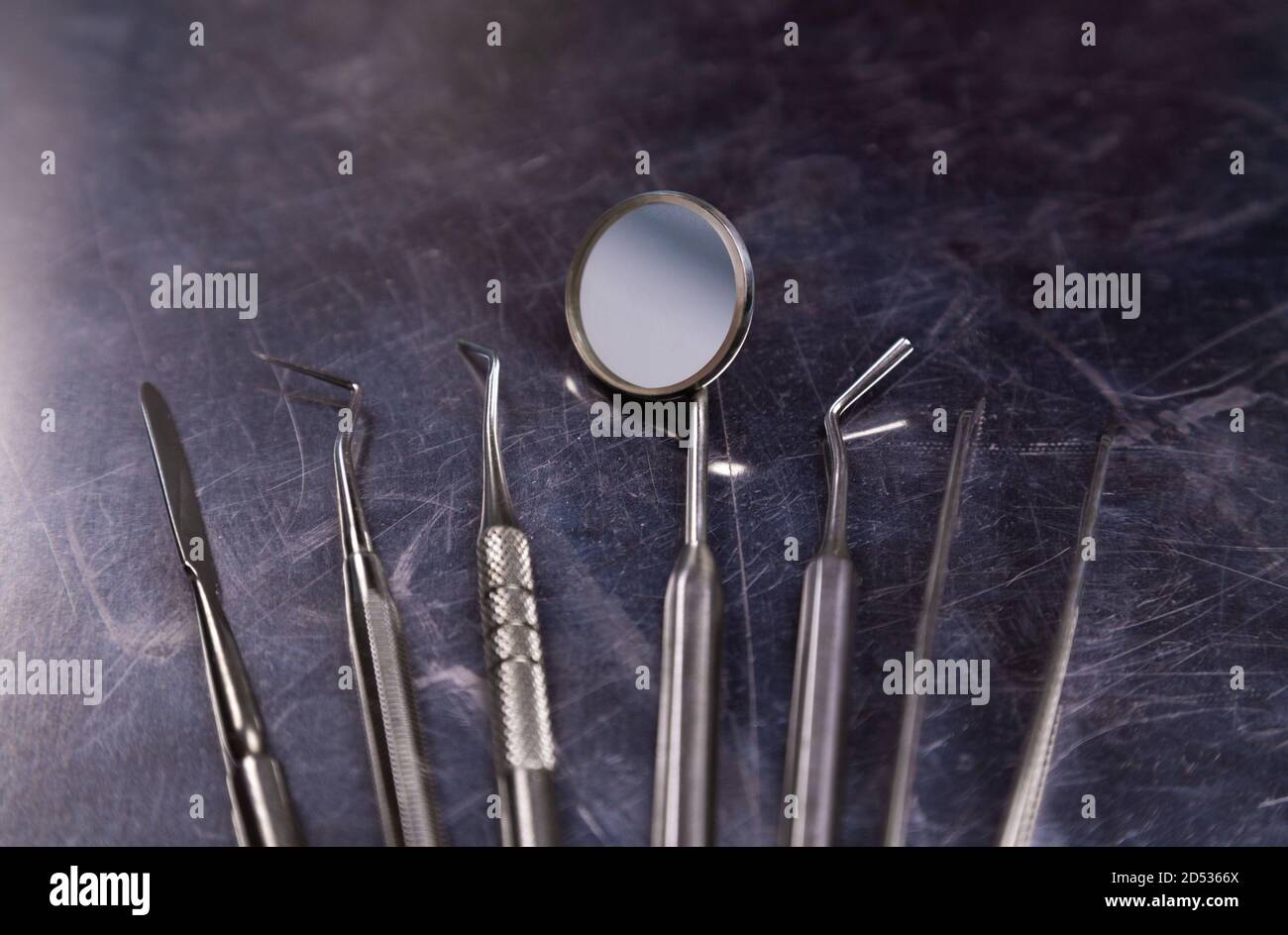 Set of dental instruments on metall background Stock Photo - Alamy