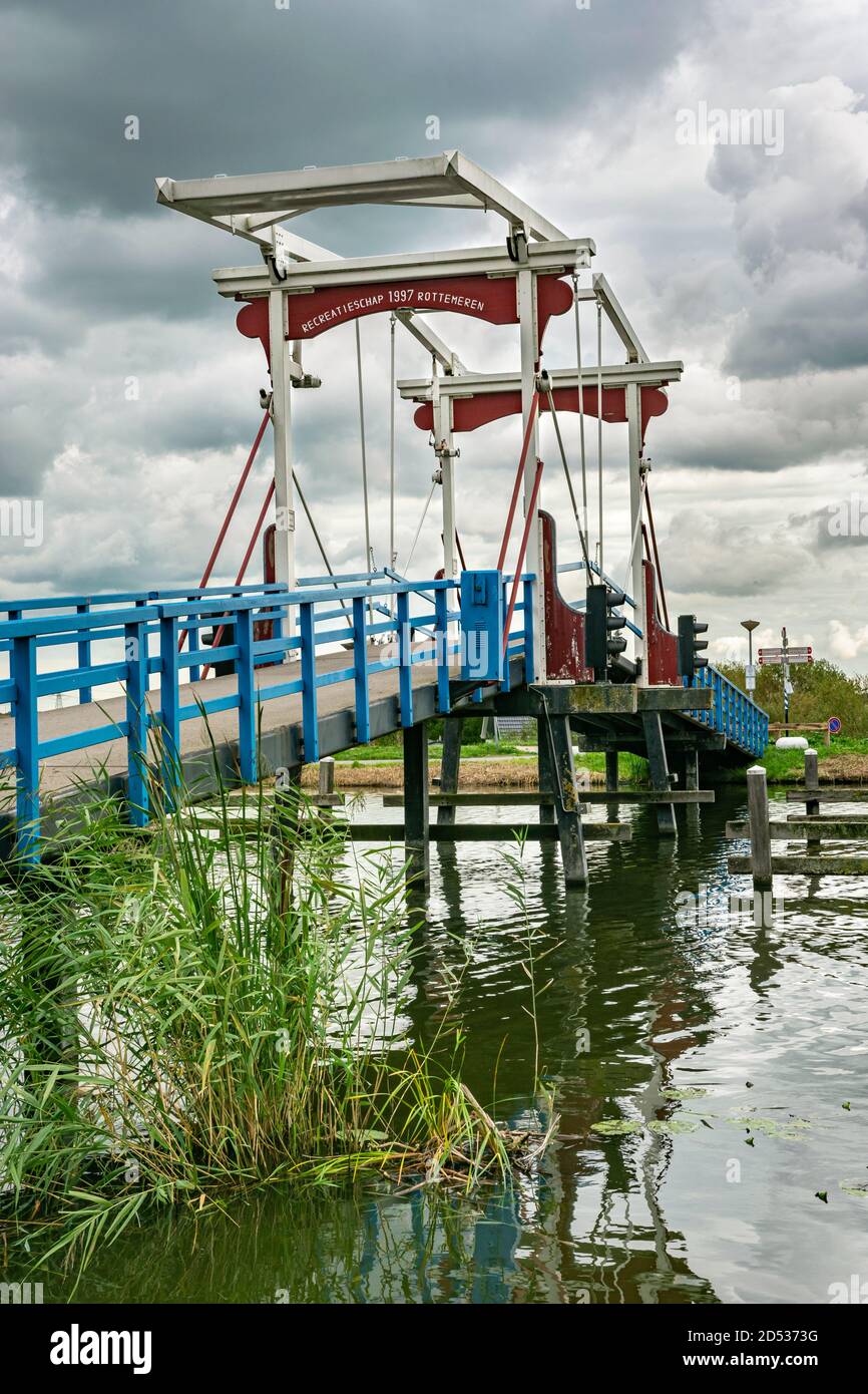 Classic dutch drawbridge over river Rotte, close to Rotterdam ...