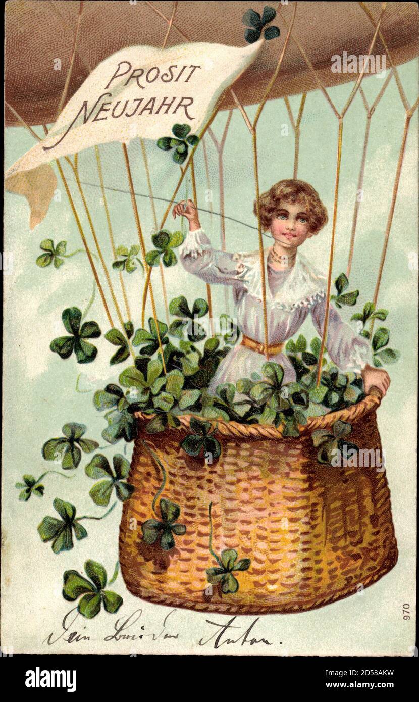 Glückwunsch Neujahr, Frau mit Kleeblättern in Luftschiff | usage worldwide Stock Photo - Alamy