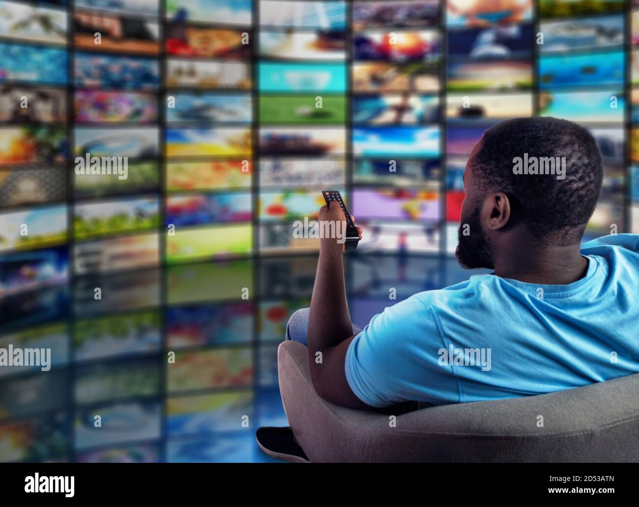 Man has fun watching a film. Concept of entertainment and streaming tv ...