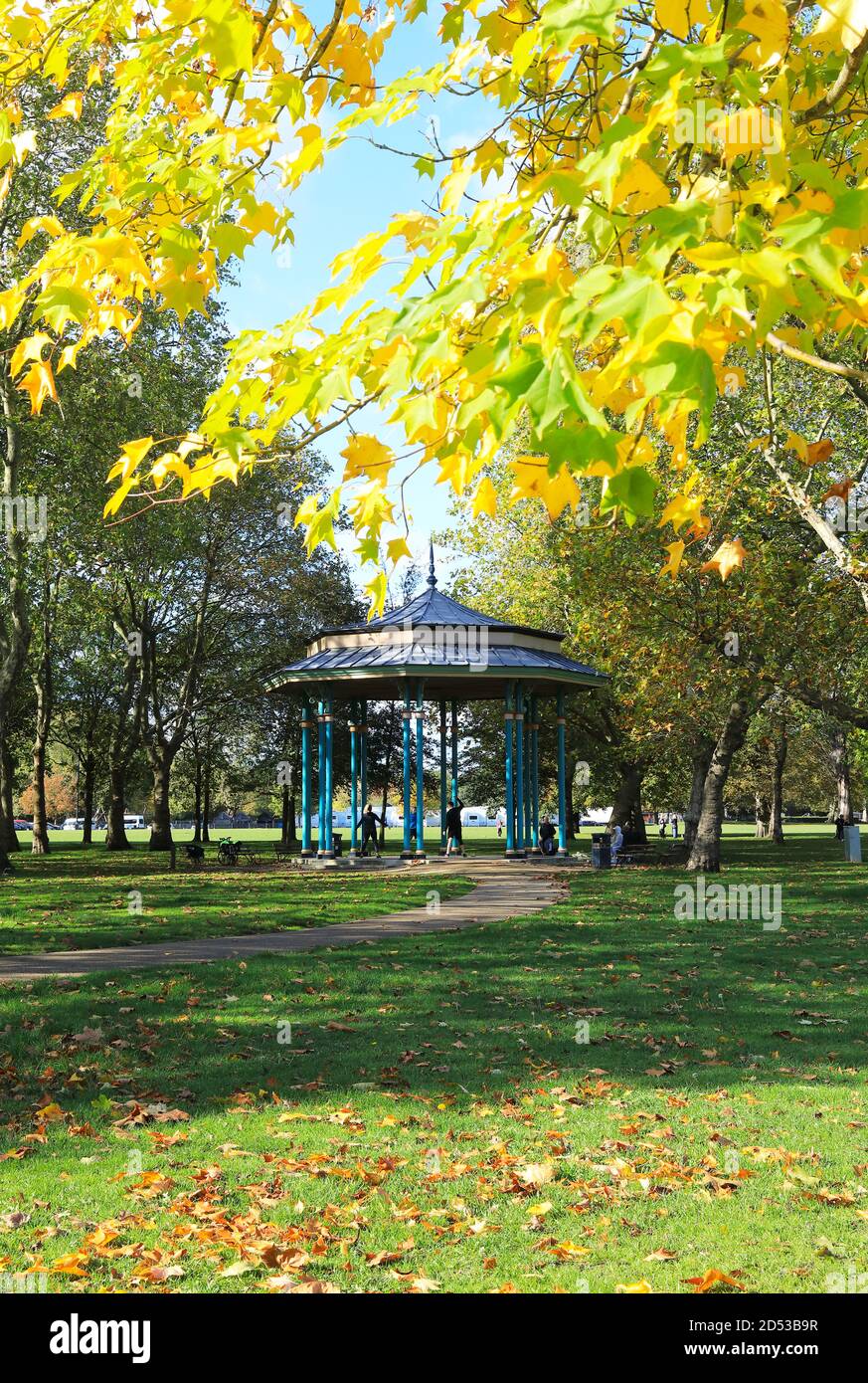Autumn colours at the bandstand in Victoria Park, in Hackney, east ...