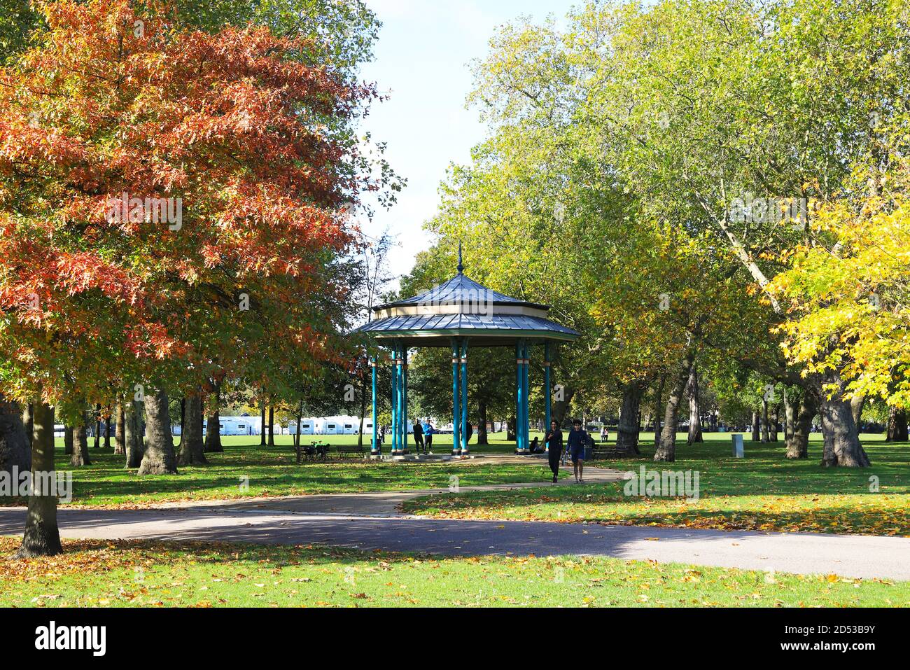 Autumn colours at the bandstand in Victoria Park, in Hackney, east ...