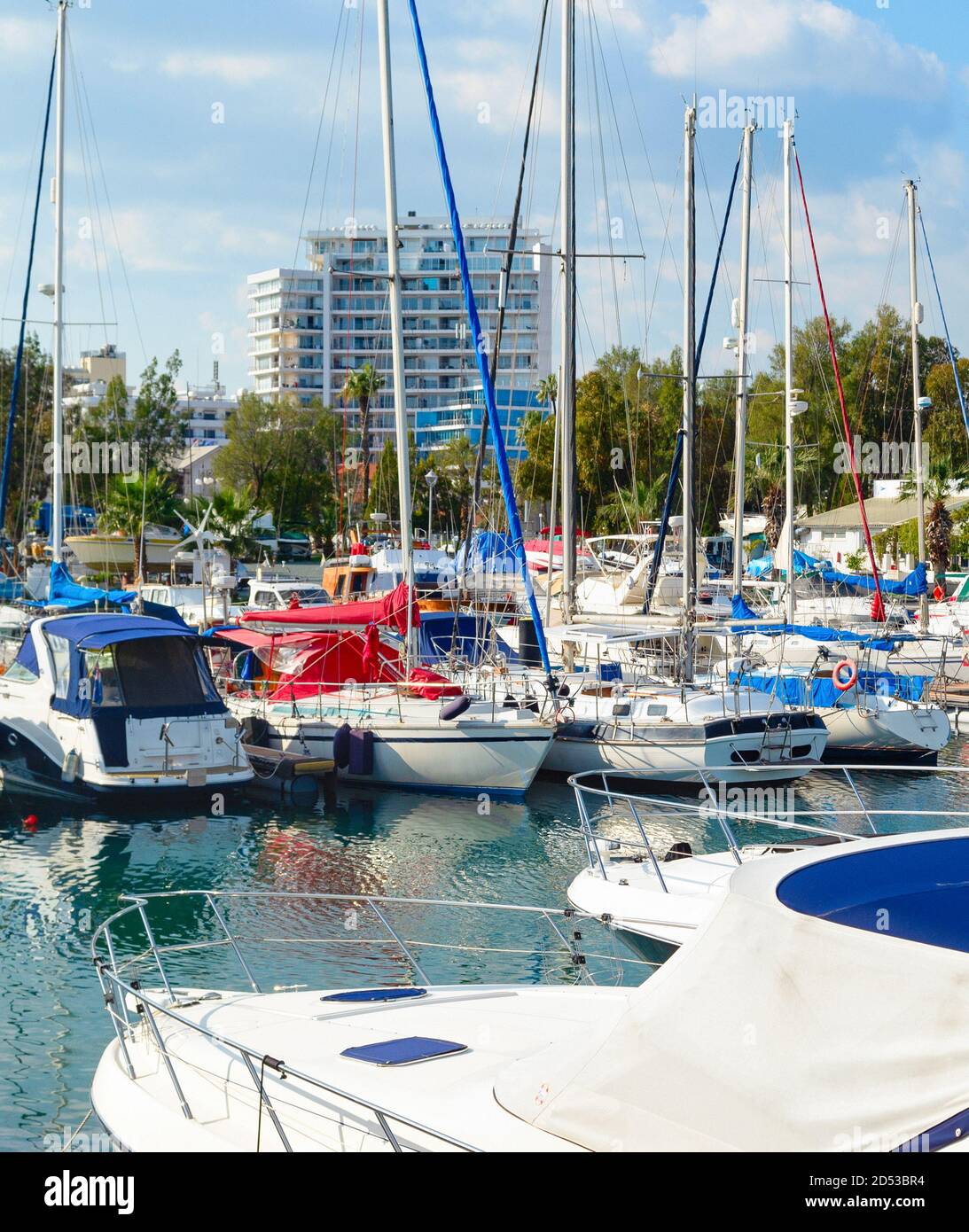 Marina with white yahts and motorboats, Harbour of Laernaca in bright ...