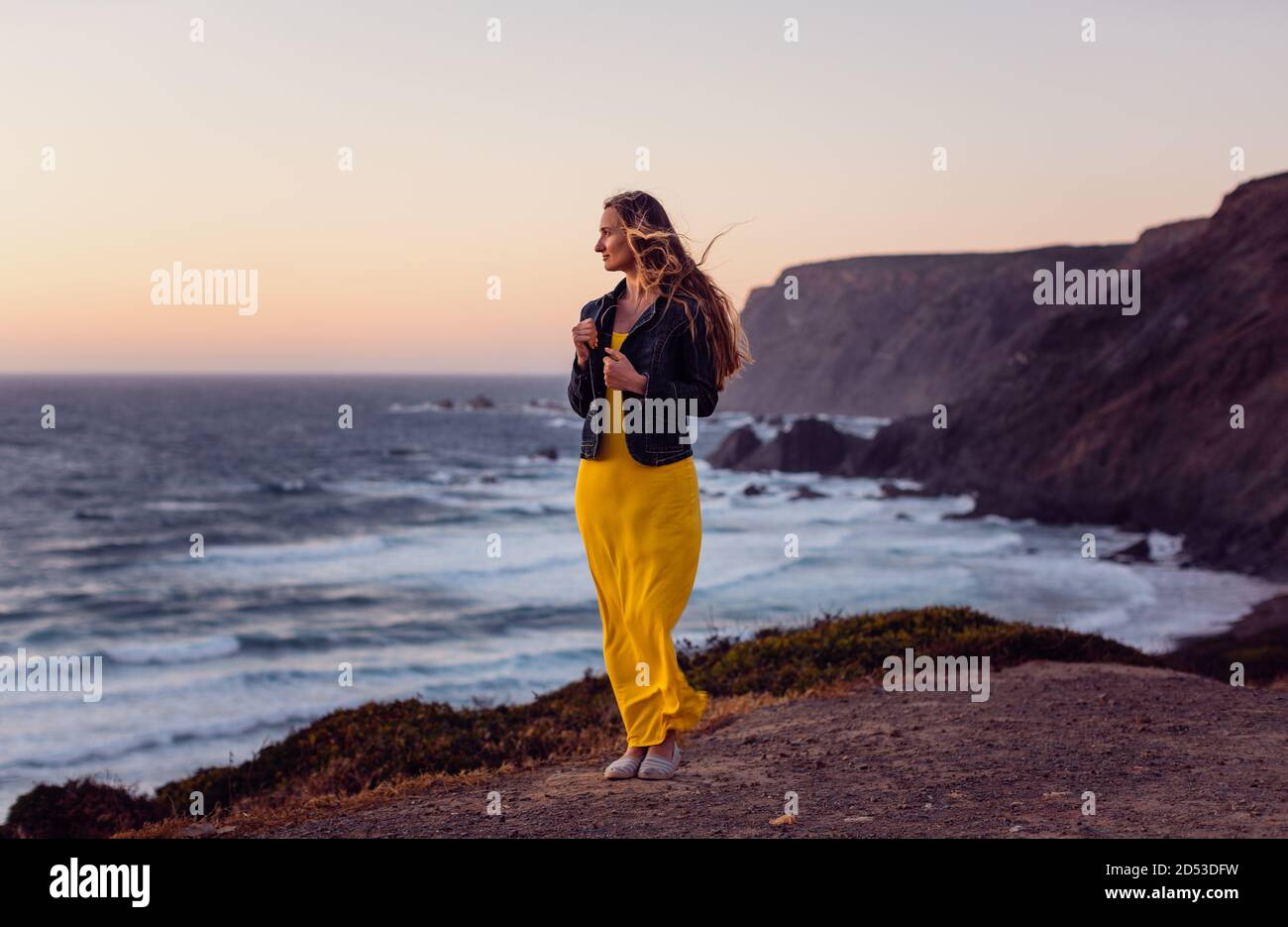 Woman in wind sea hi-res stock photography and images - Alamy