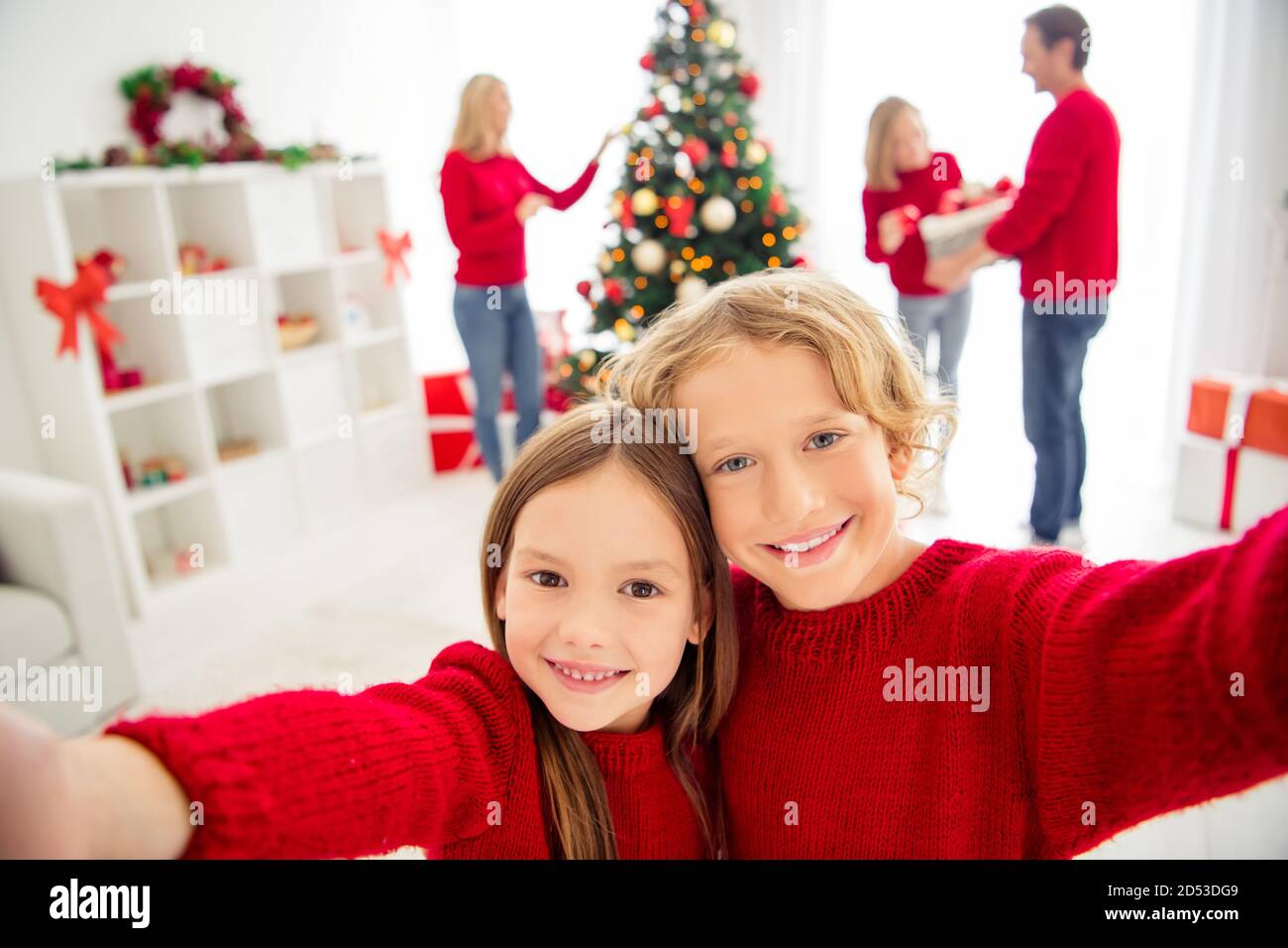 Closeup photo of full big family five people meeting two little kids ...