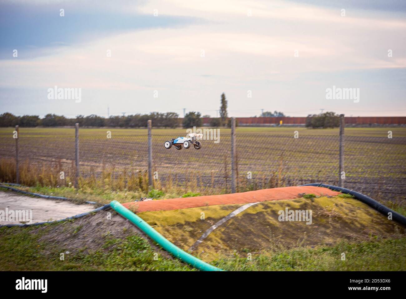 Red car driving on dirt hi-res stock photography and images - Alamy
