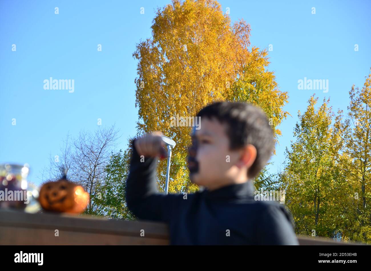 boy with black makeup for halloween, zombie. Scary little boy smiling ...