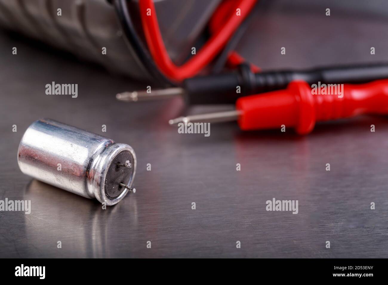 Capacitor and electrical meter. Measurement work in an electrical ...
