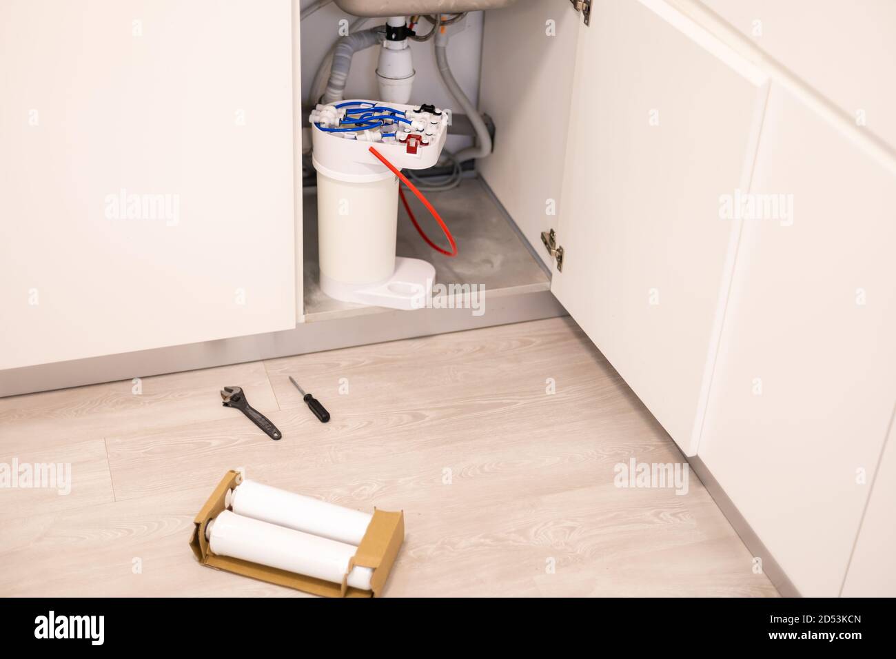 Installation of reverse osmosis water purification system Stock Photo ...