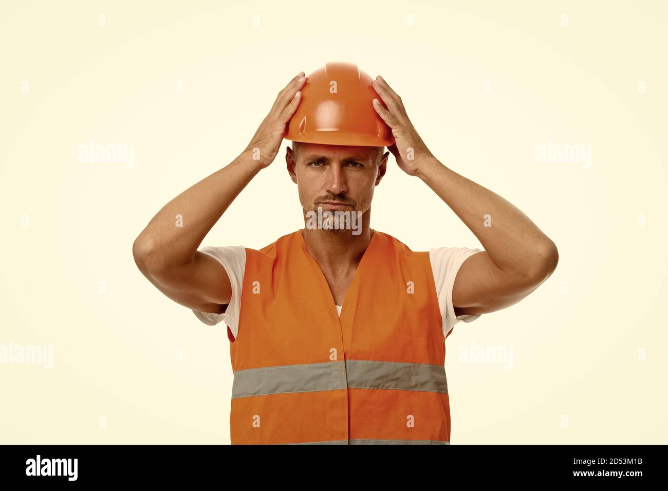 repairing and construction. man in orange helmet. engineer wear hardhat ...