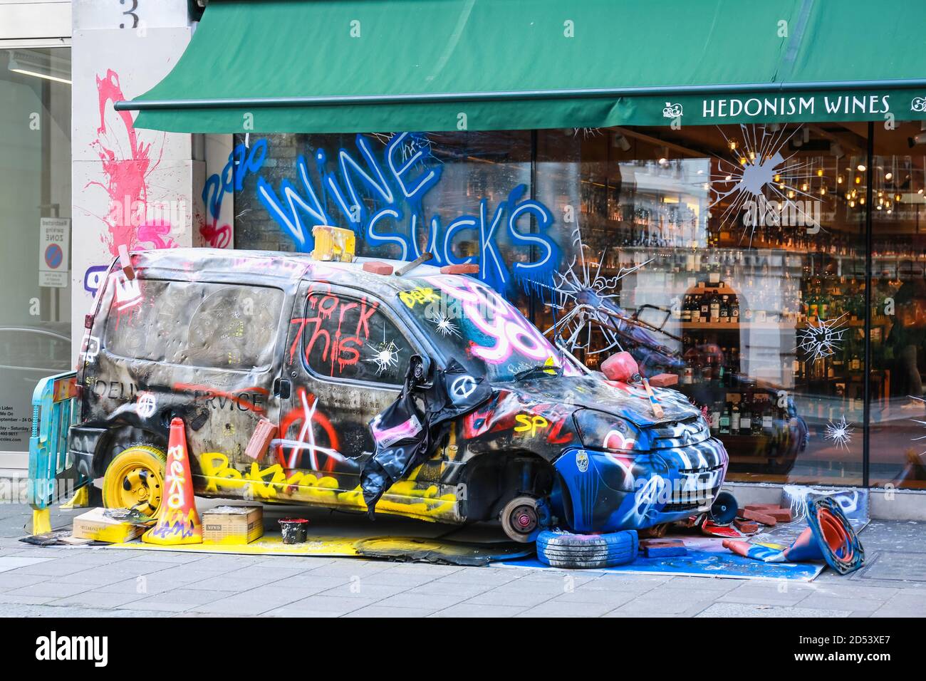 London, UK. 07 October 2020. Art installation of a wrecked car with ...
