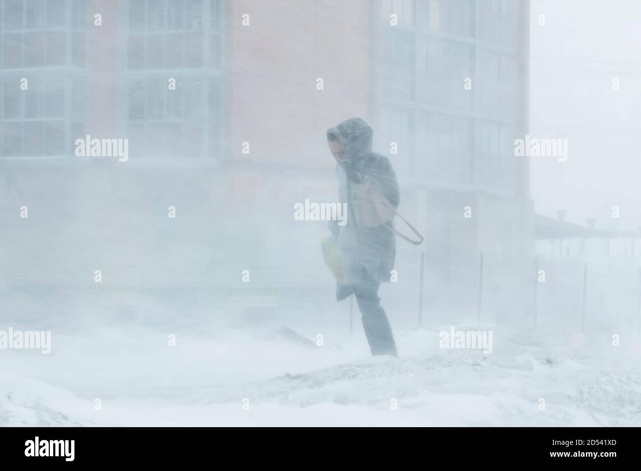 Blizzard bad weather snow and strong wind in the city Stock Photo - Alamy