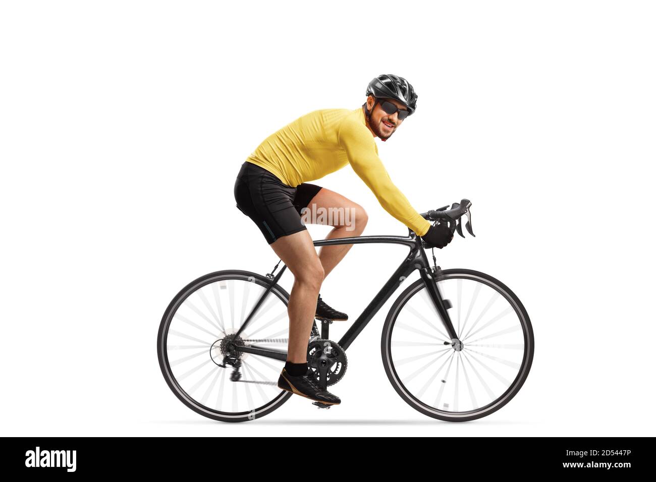 Male cyclist riding a road bicycle and looking at the camera isolated ...