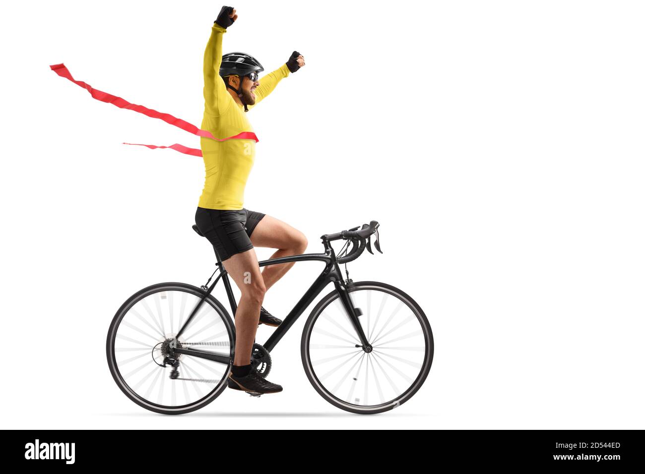 Male cyclist winner finishing a race with a road bicycle and gesturing ...