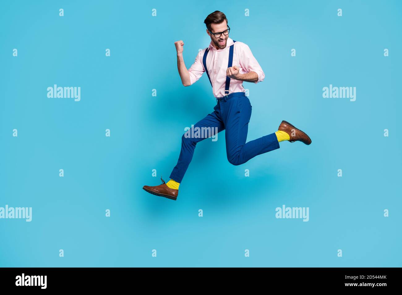 Full size profile photo of handsome man jump high up running ...