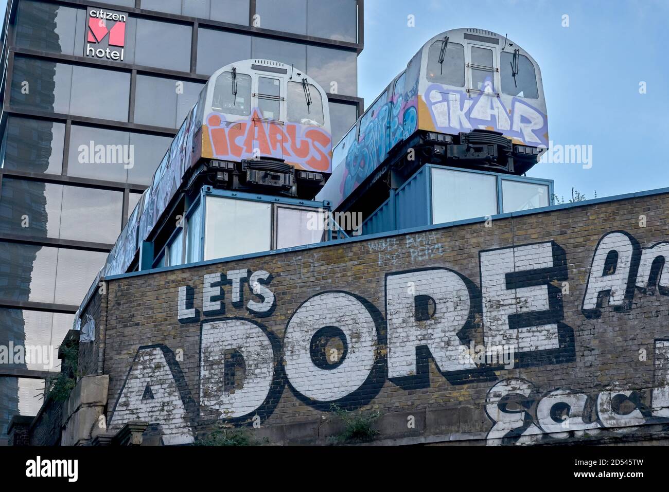 tube train offices shoreditch Stock Photo - Alamy