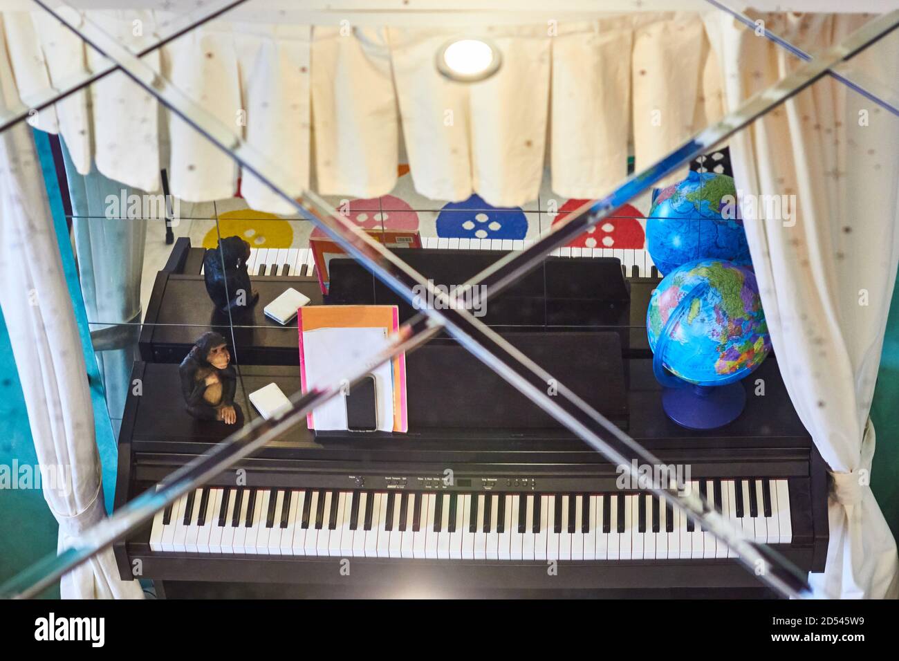 Bedroom interior is reflected in the ceiling mirror. Reflection of the ...