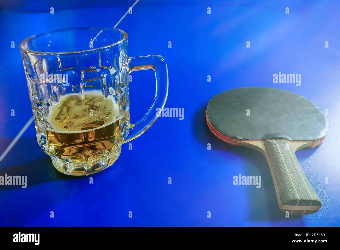 Alcohol and a ping-pong racket on the table Stock Photo - Alamy