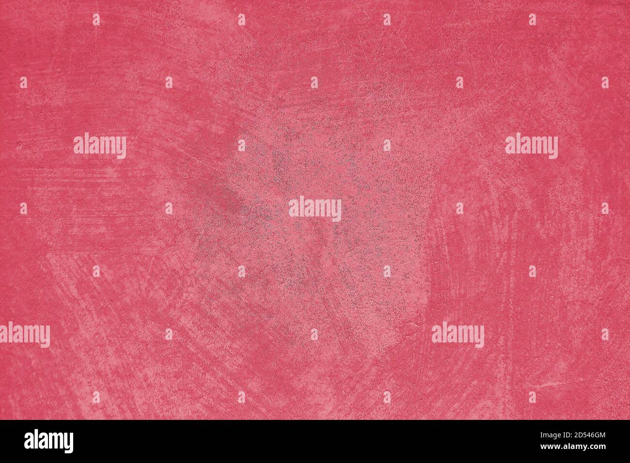 The background is a deep red painting on concrete wall with rough ...