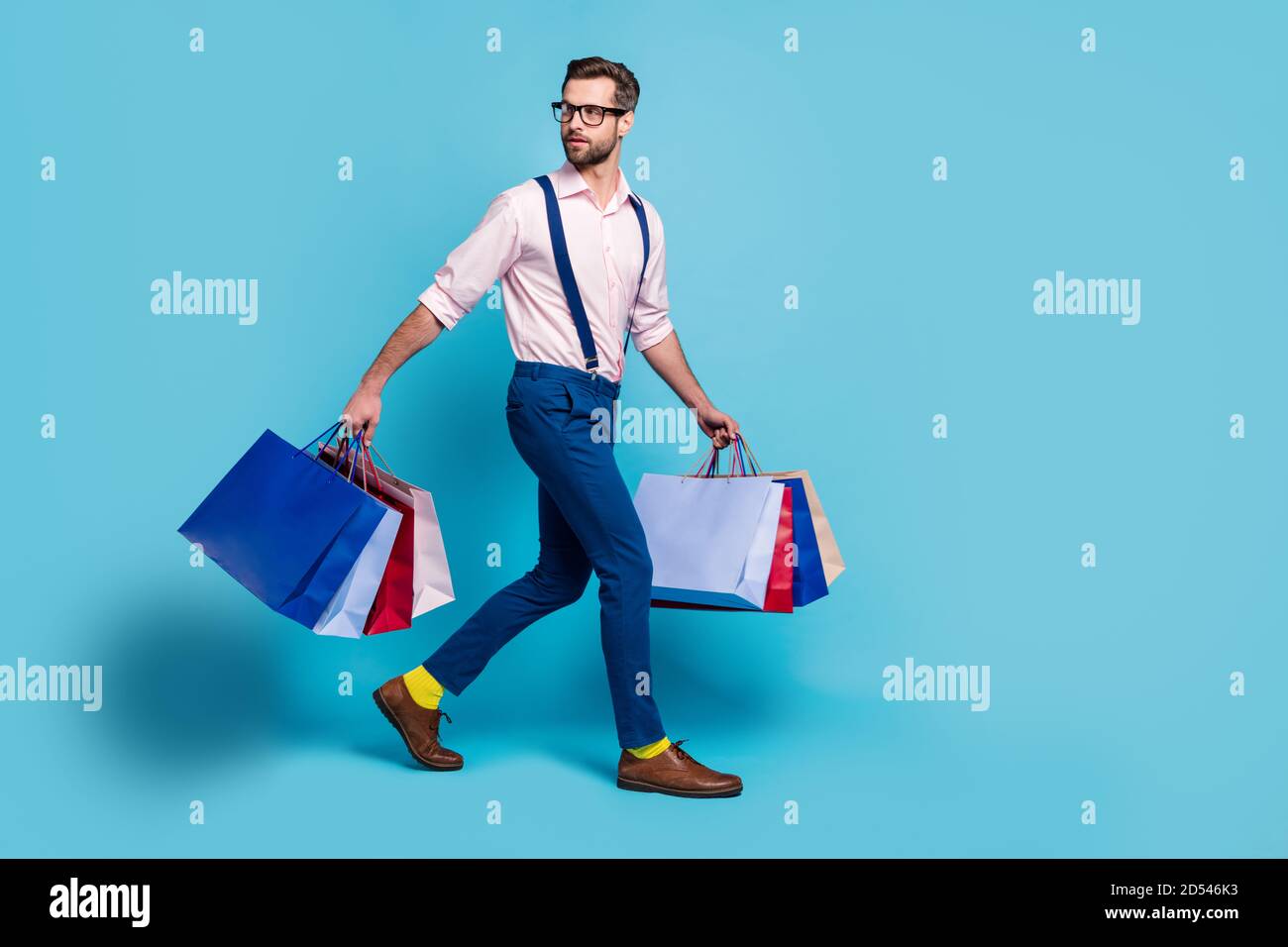 Full body profile photo of handsome business man carry many bags buy ...