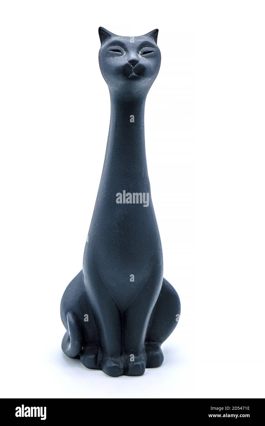 White background, isolate. Figurine of a sitting big cat. Statue of a ...