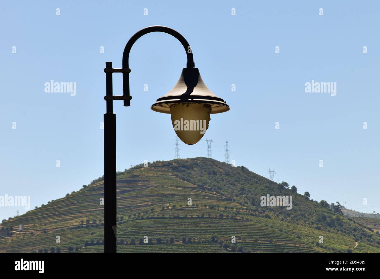 Street lamp illuminates the mountain Stock Photo - Alamy