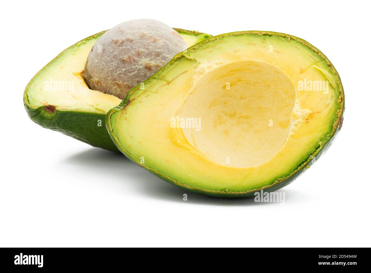 fresh avocado cut in half Stock Photo - Alamy