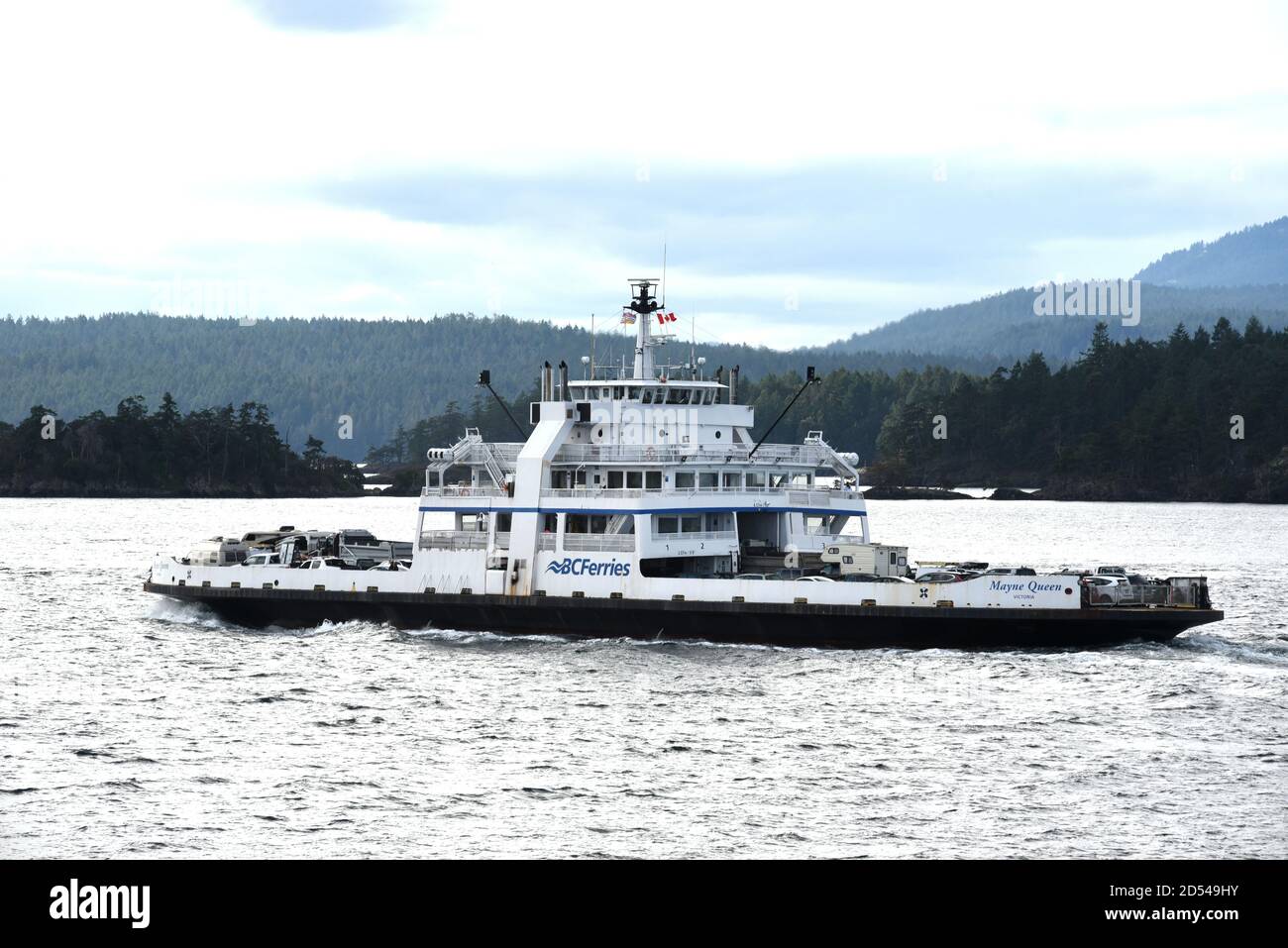 The BC Ferries Mayne Queen ferry transports cars and passengers among ...