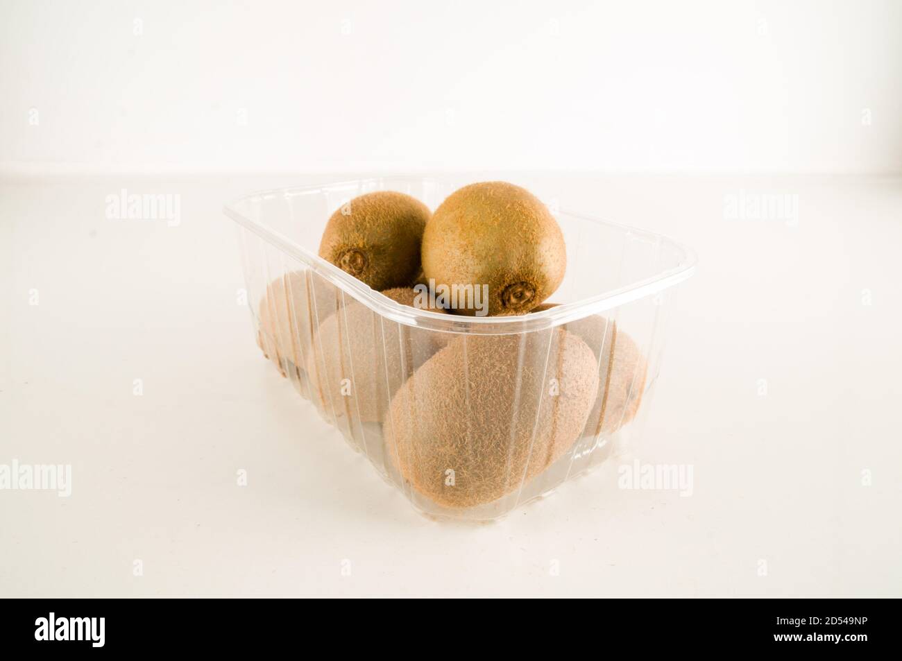 Kiwi in a box isolated Stock Photo - Alamy