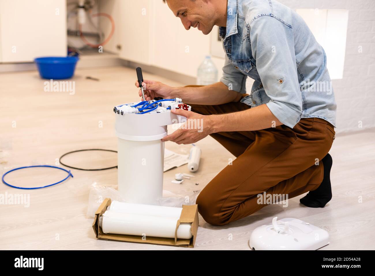 Water filtration installation repair hi-res stock photography and ...