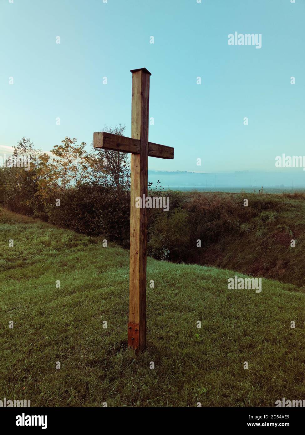 big cross on autumn meadow, field, trees Stock Photo - Alamy
