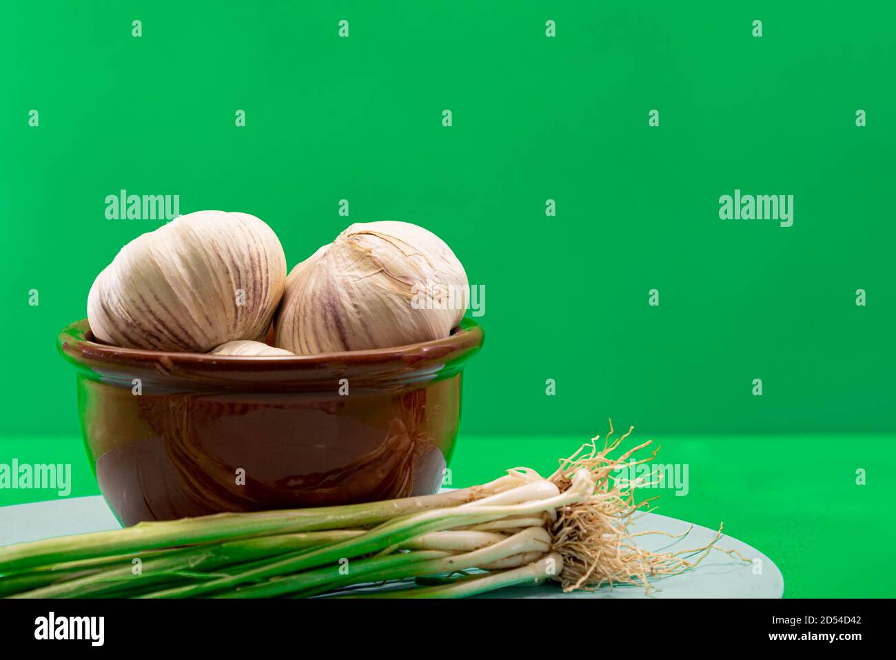 Garlic bulb. Garlic and leaves. Seasoning. Condiment. Culinary delicacy ...