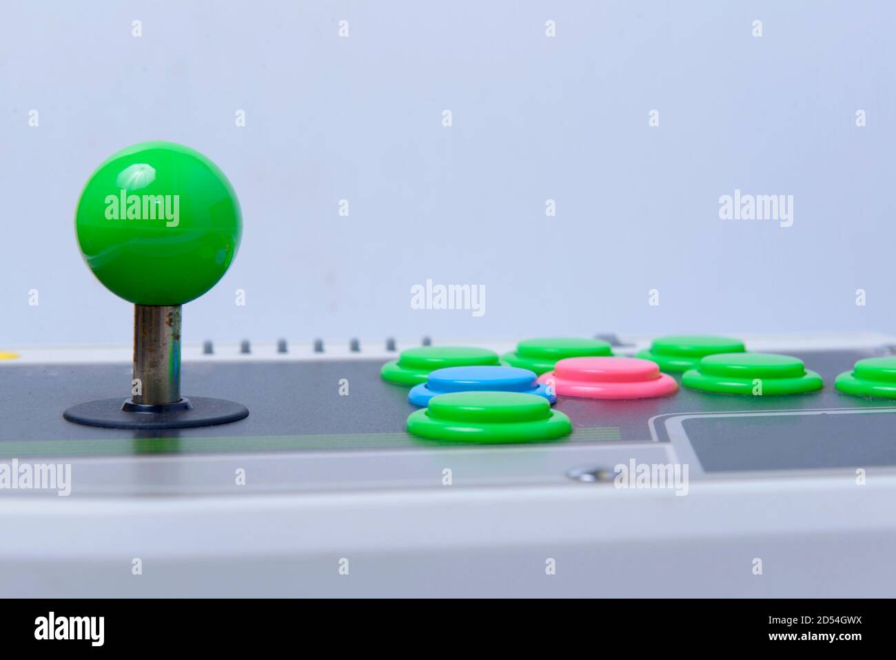 Close up view of the old joystick controller with white background ...