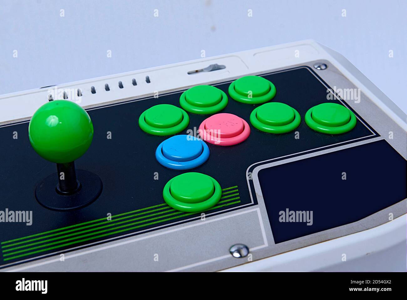 Close up view of the old joystick controller with white background ...