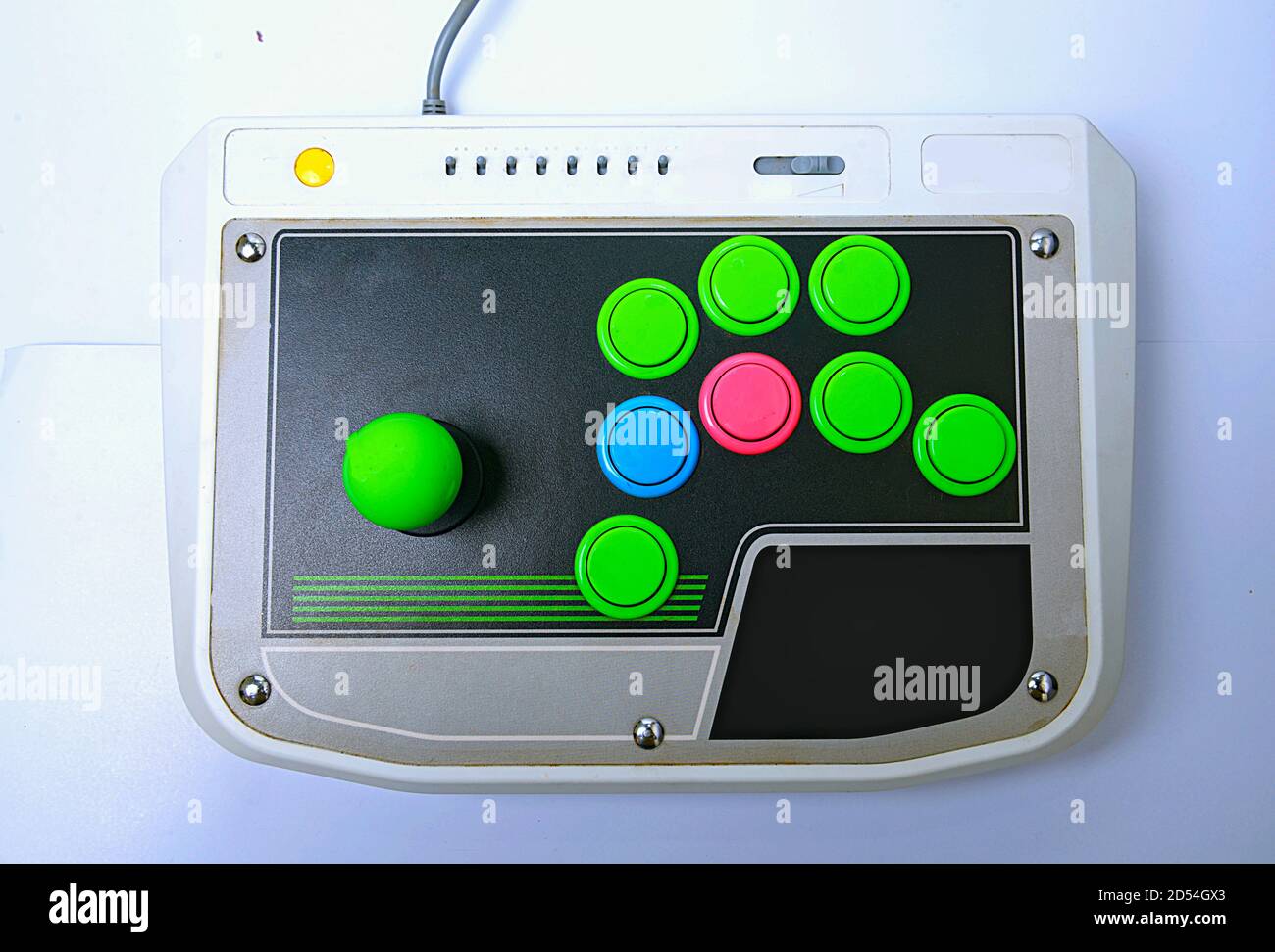 Close up view of the old joystick controller with white background ...