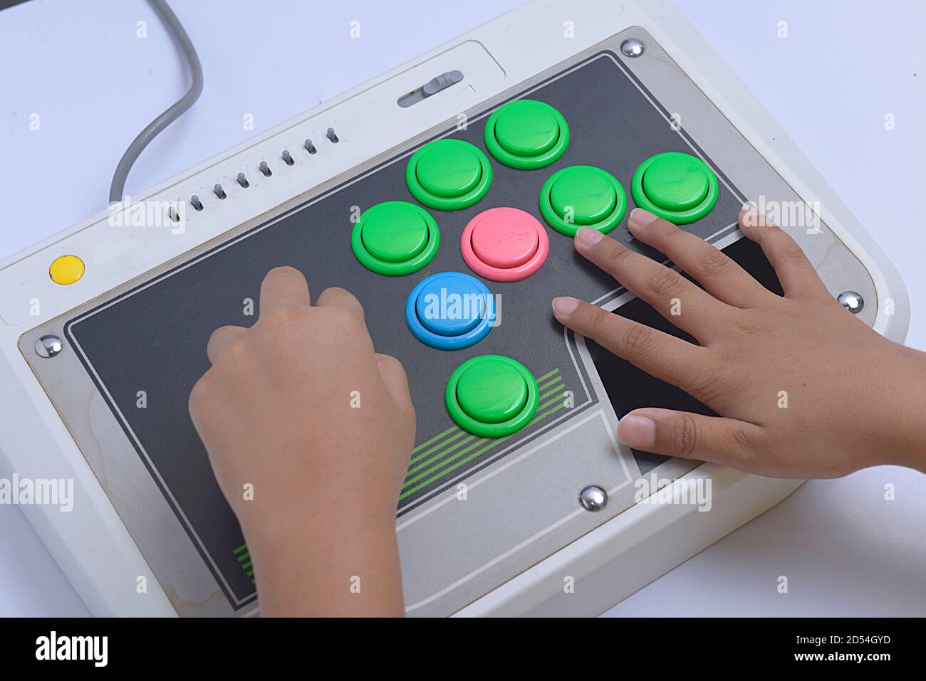 Hand playing the old joystick controller with white background Stock ...