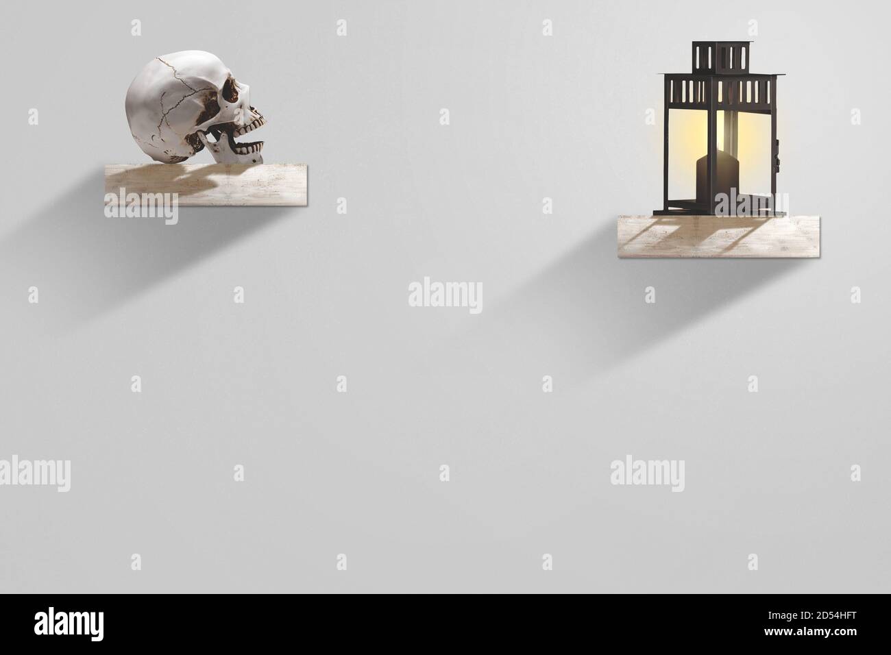 Human skull and lantern on white wall background Stock Photo - Alamy