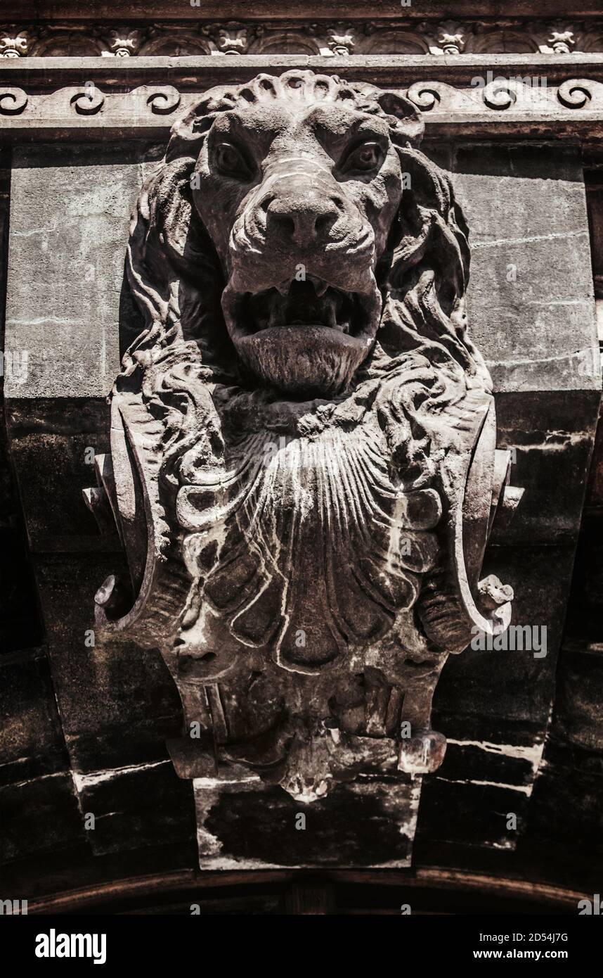 Photo of a stone lion statue bas-relief on building Stock Photo - Alamy