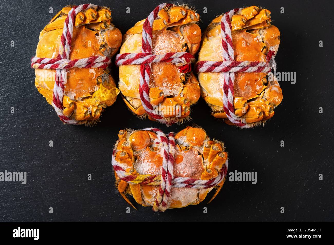 top view frozen cooked crabs on dark Stock Photo - Alamy