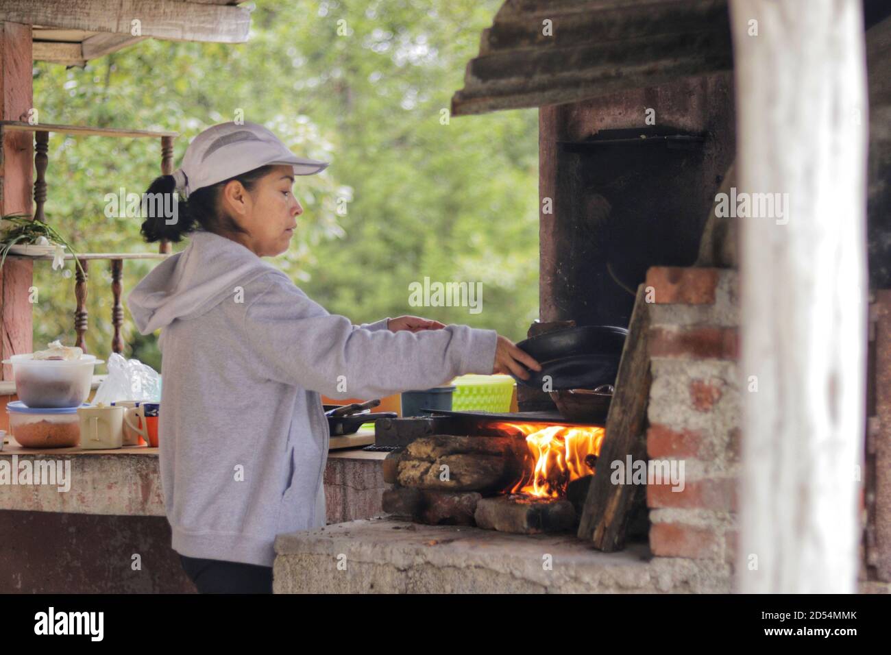 Old Woman Cooking Outside House High Resolution Stock Photography and ...