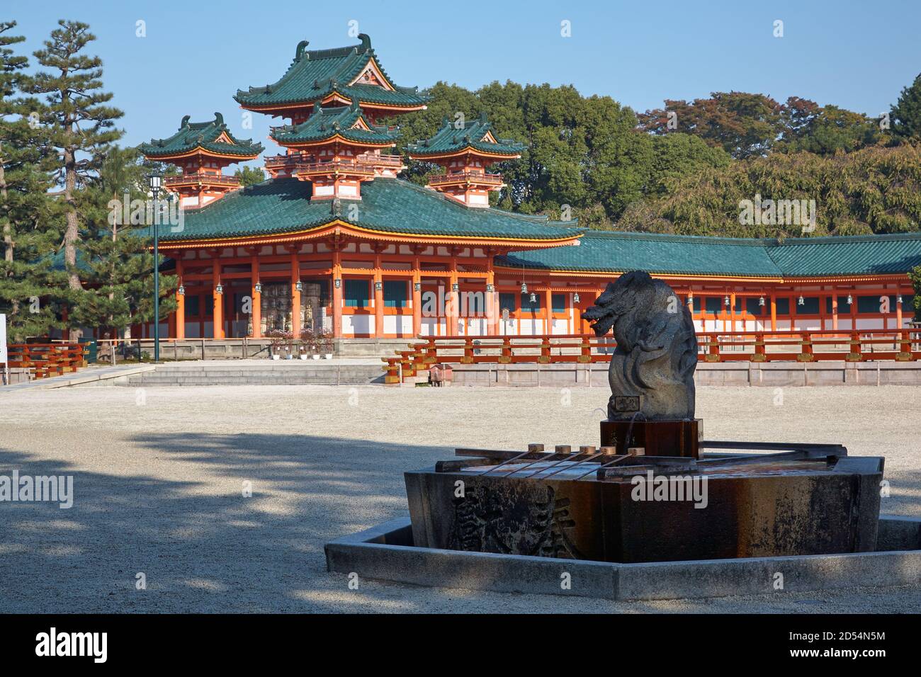 Dragon statue over water ablution basin for ceremonial purification ...