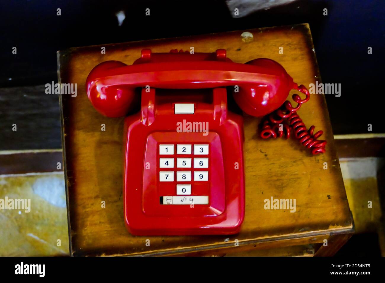 red telephone on wooden background, in Lisbon Capital City of Portugal ...