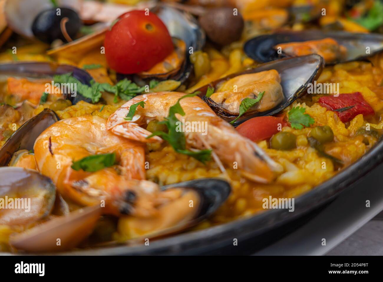 Spanish seafood Paella de Marisco, Paella Marinera with mussels ...