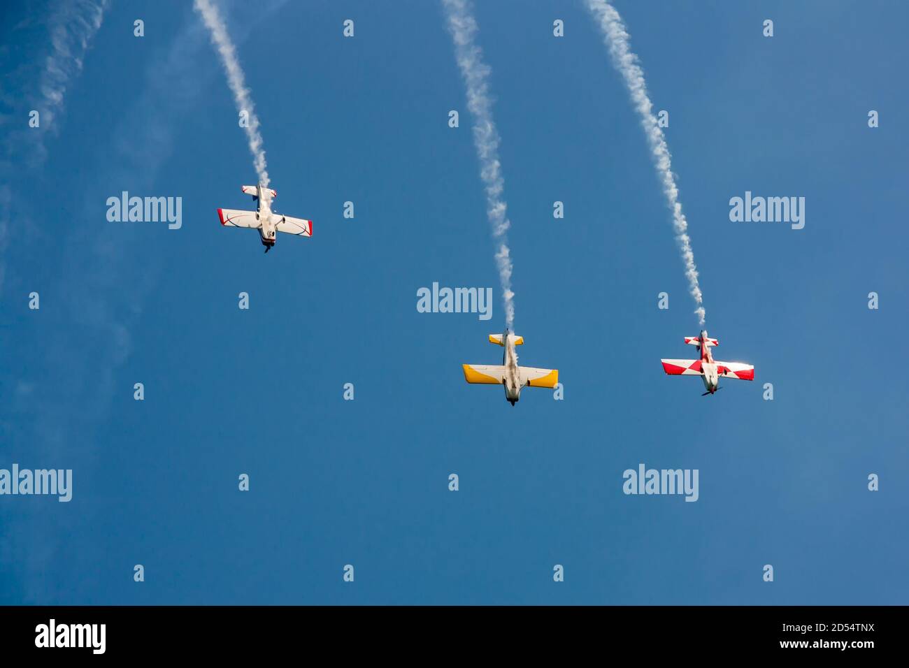 Acrobatic performance of three sports airplanes with the release of ...