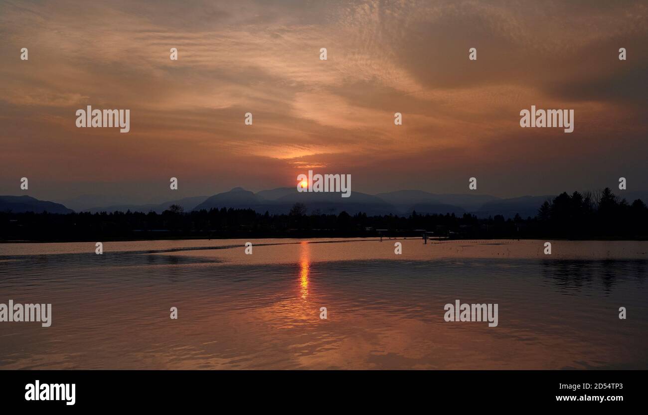 Smokey sunset, Courtenay, Vancouver Island, British Columbia, Canada ...