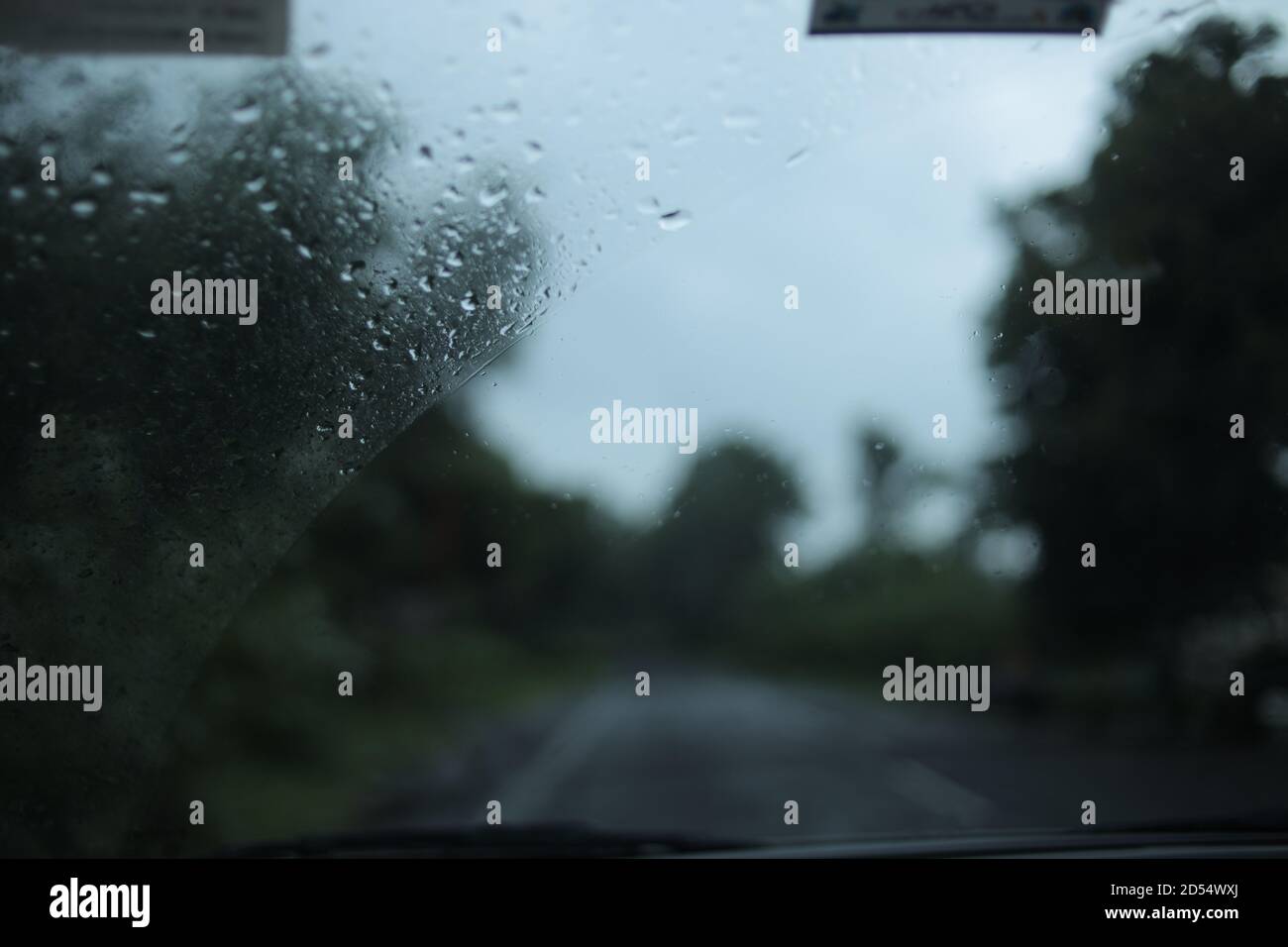 Morning ride by car. The view from the car to the Raining Day Stock ...
