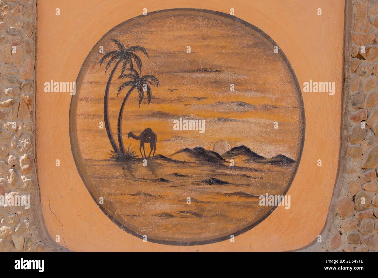 Camel, sun and palm trees in the desert Stock Photo - Alamy