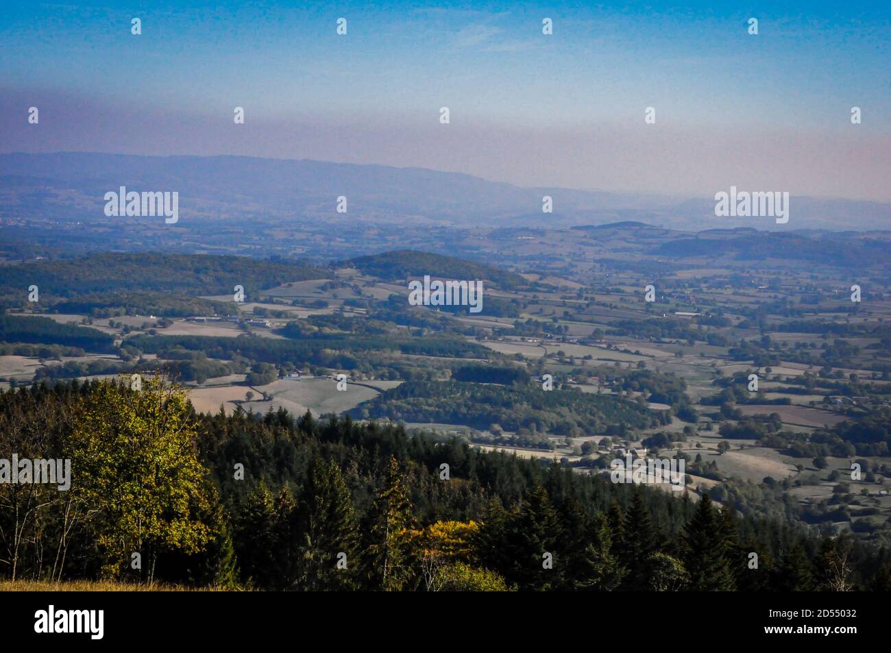 Wide valley viewed from a mountain Stock Photo - Alamy